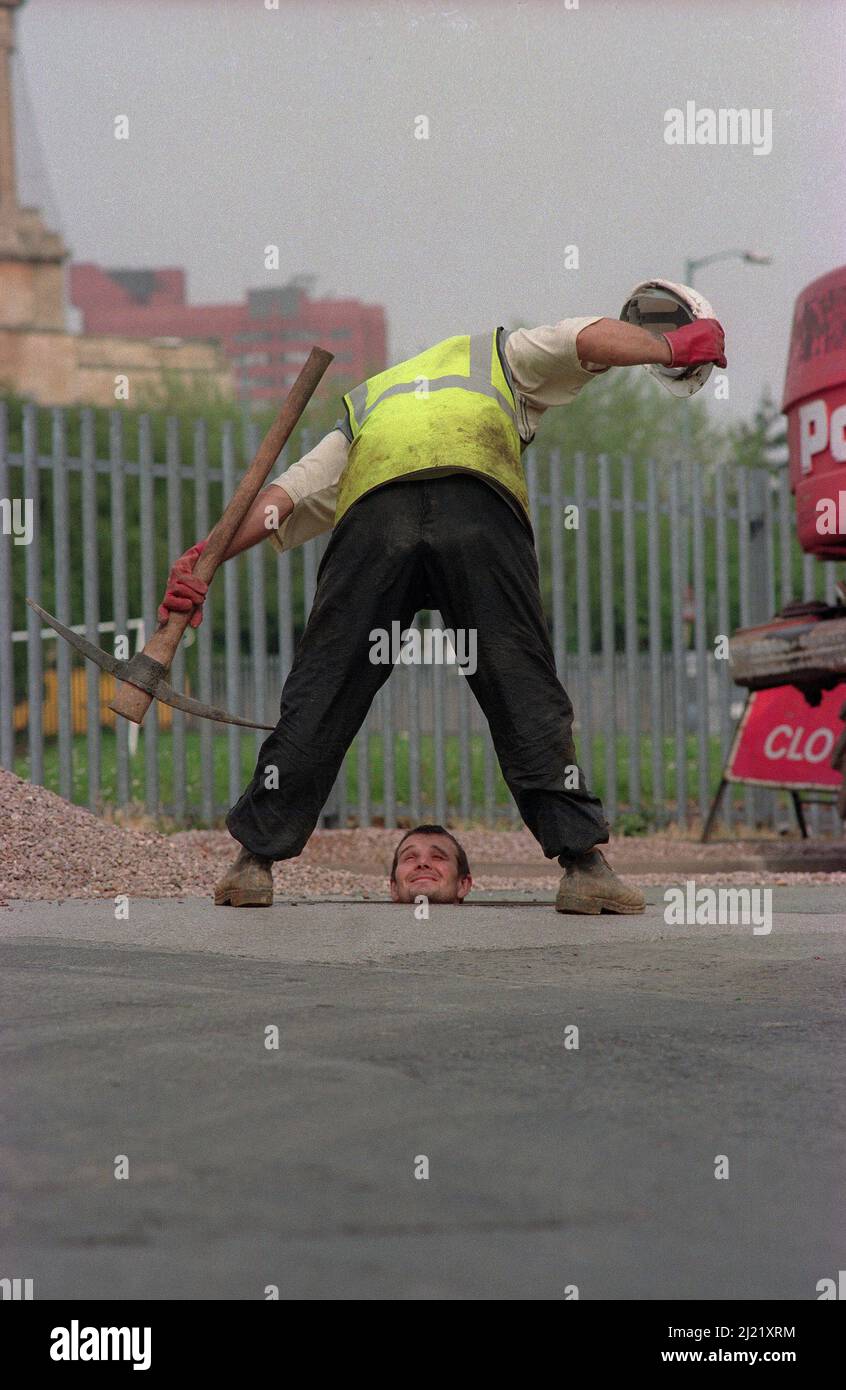 Apparently this headless workman bends over to find his head during a ...