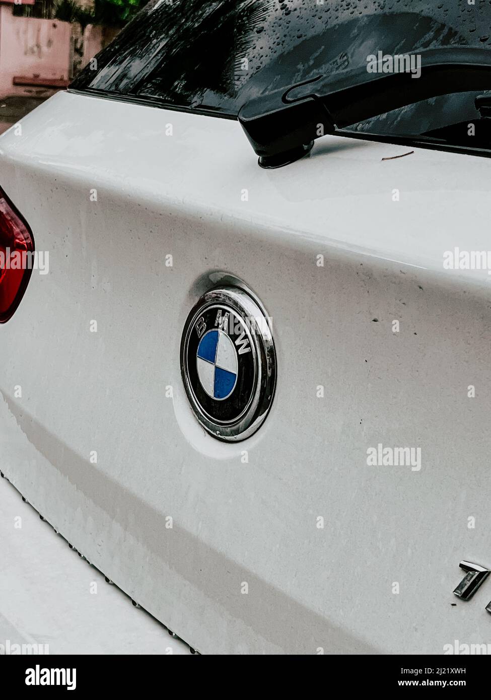 Rear view of a white BMW car back Stock Photo - Alamy