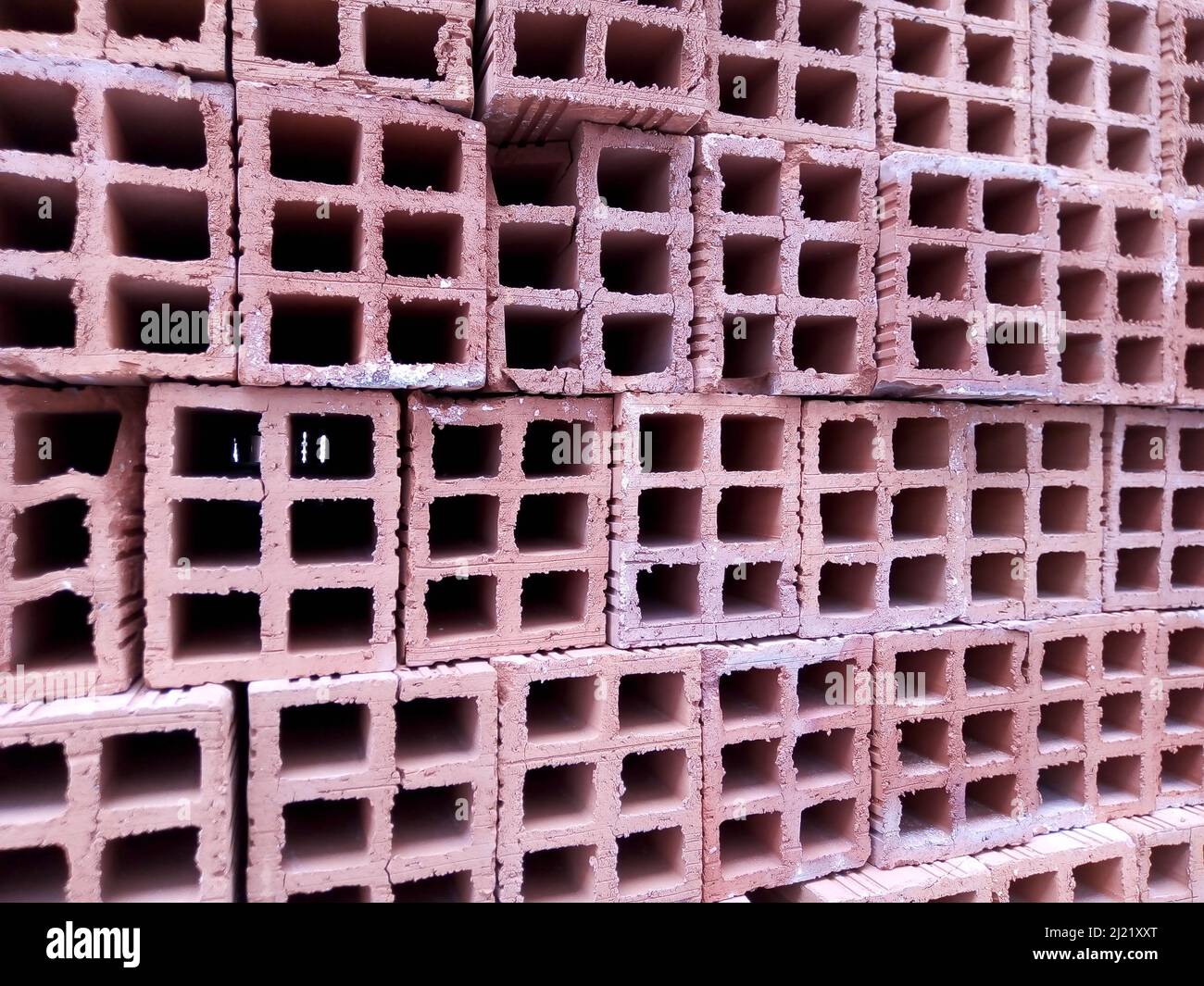 Red bricks for masonry construction Stock Photo - Alamy