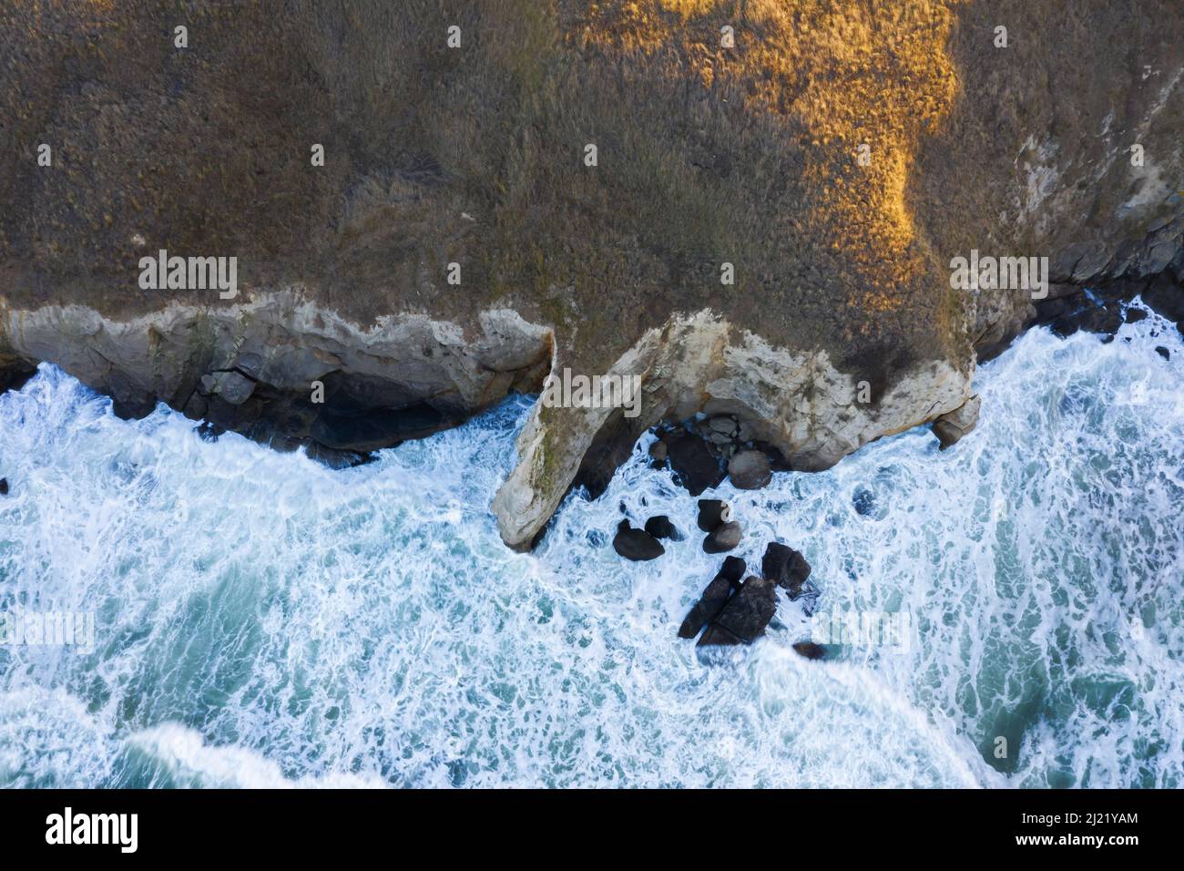 Aerial view to a beautiful wild rocky beach and big waves, Black Sea ...