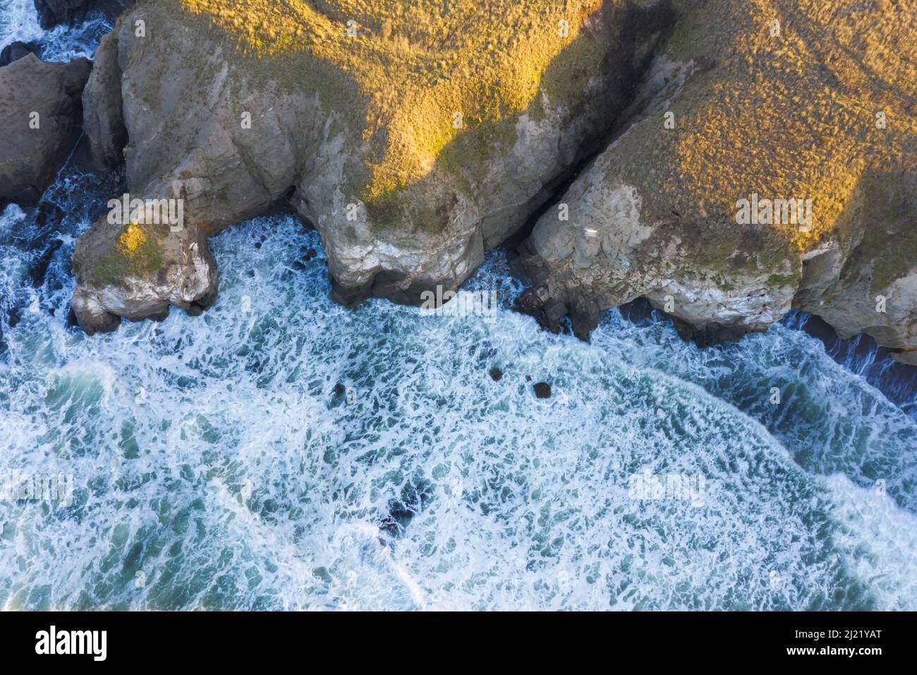 Aerial view to a beautiful wild rocky beach and big waves, Black Sea ...