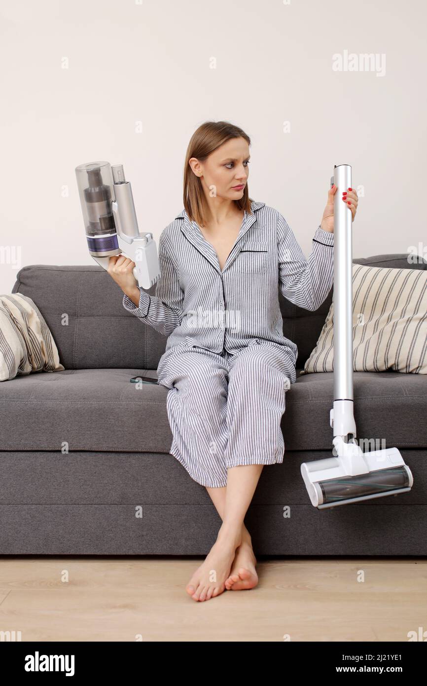 Asian woman vacuuming hi-res stock photography and images - Alamy