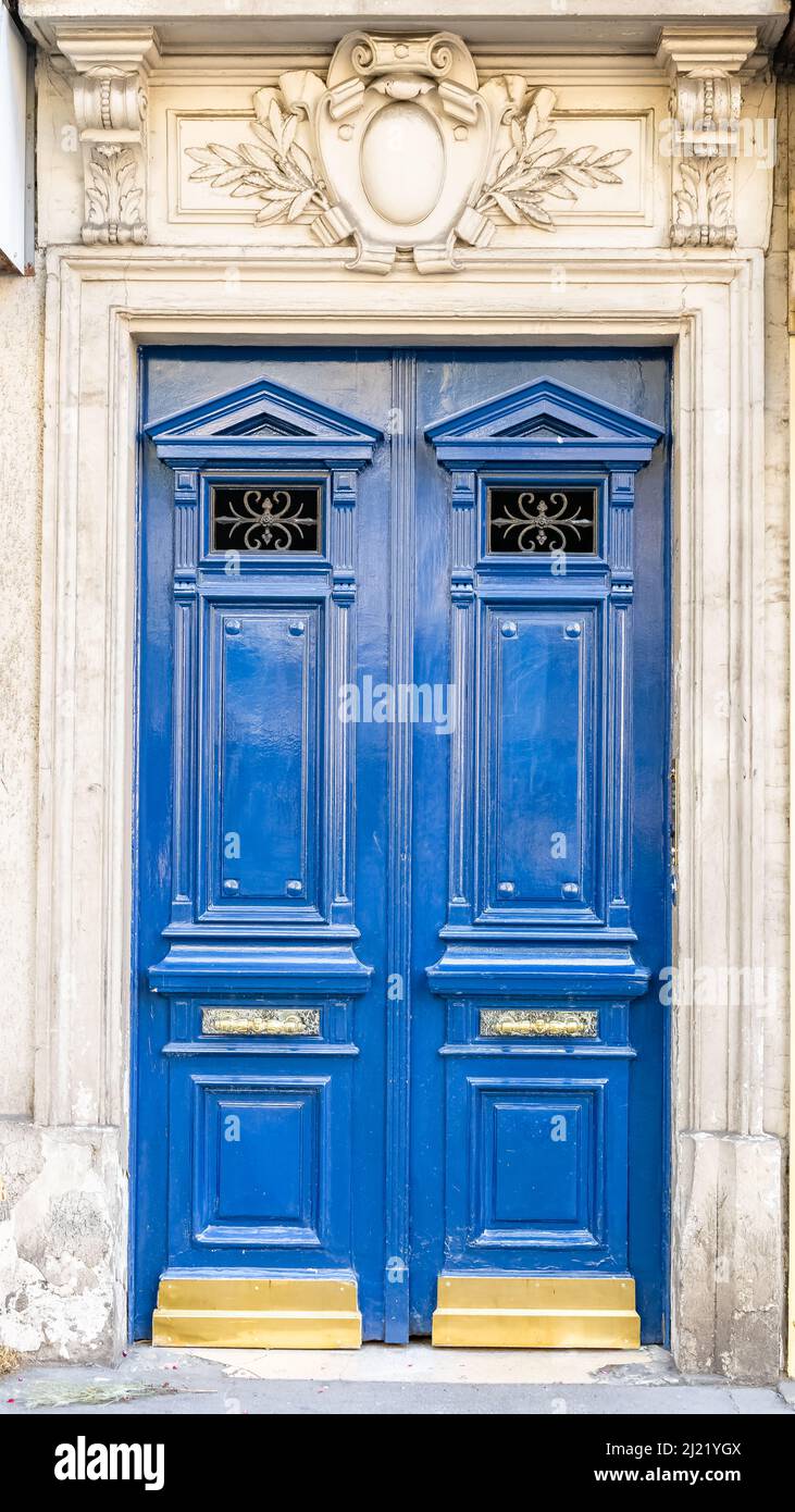 Paris, a blue wooden door, typical building in the center Stock Photo ...