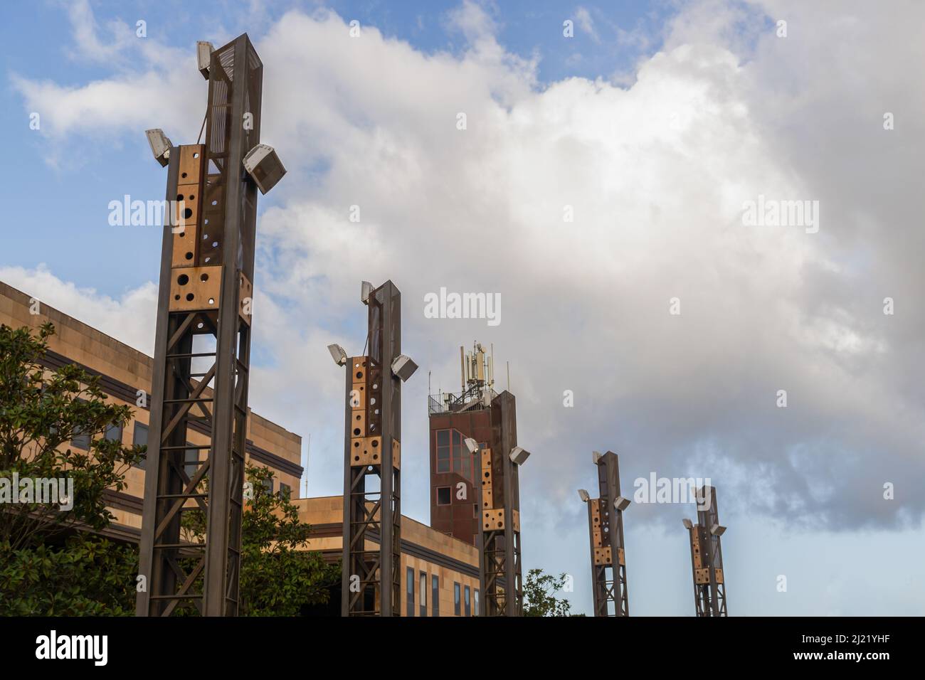 lighting towers blue sky background with clouds Stock Photo - Alamy