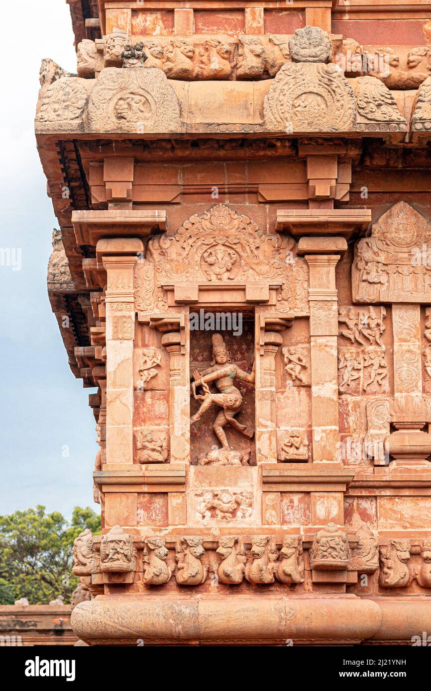 A vertical shot of a statue of a God on the outside of Thanjavur Periya ...