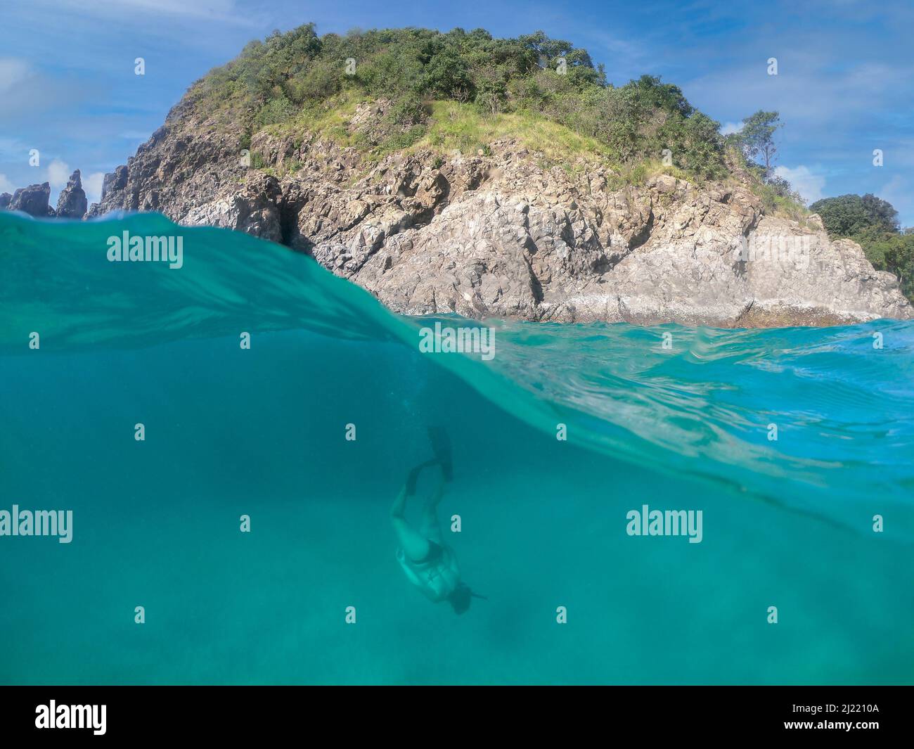 Young woman dive rocks hi-res stock photography and images - Alamy