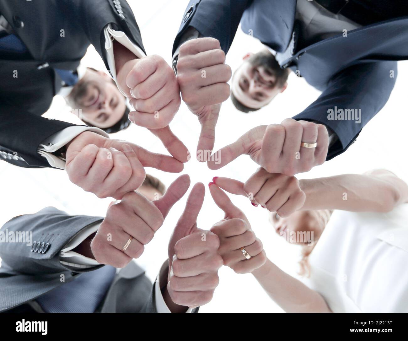 close up.business team showing their unity Stock Photo - Alamy