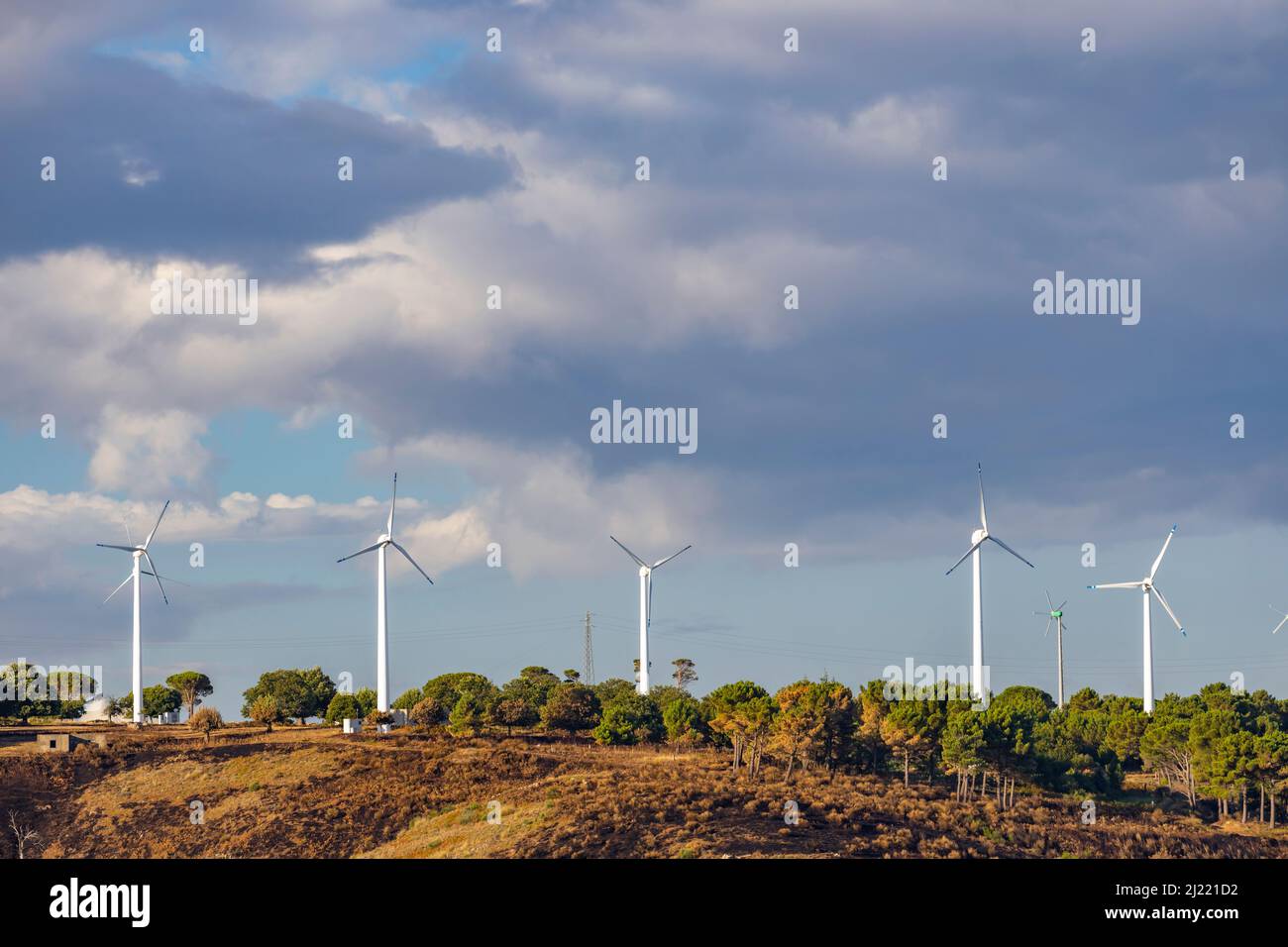 wind power plant illuminated by morning sun near Reggio di Calabria ...