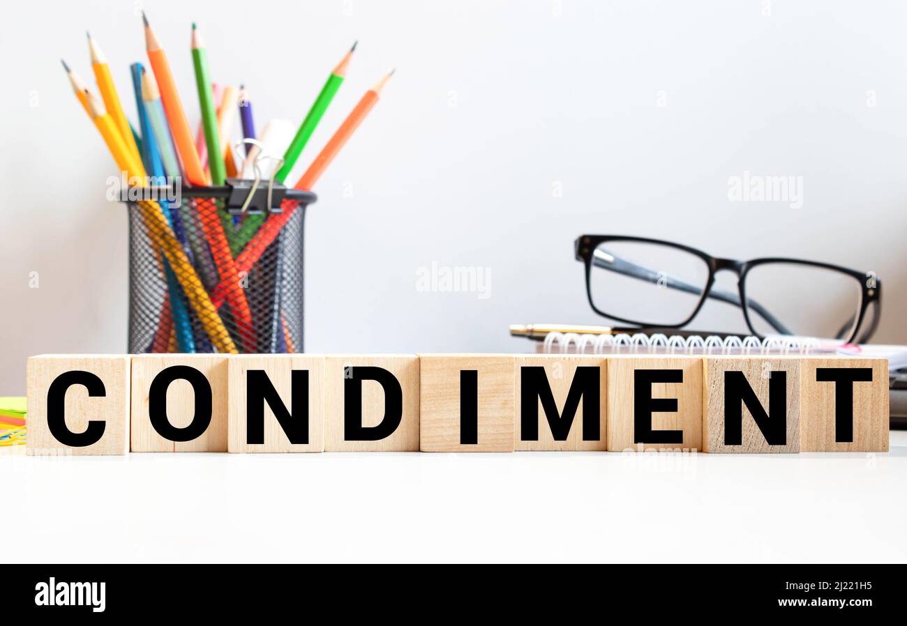 CONDIMENT word made with building blocks, concept Stock Photo - Alamy