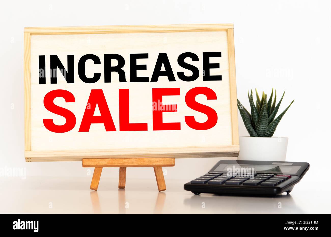 Increase sales text concept write on notebook Stock Photo - Alamy