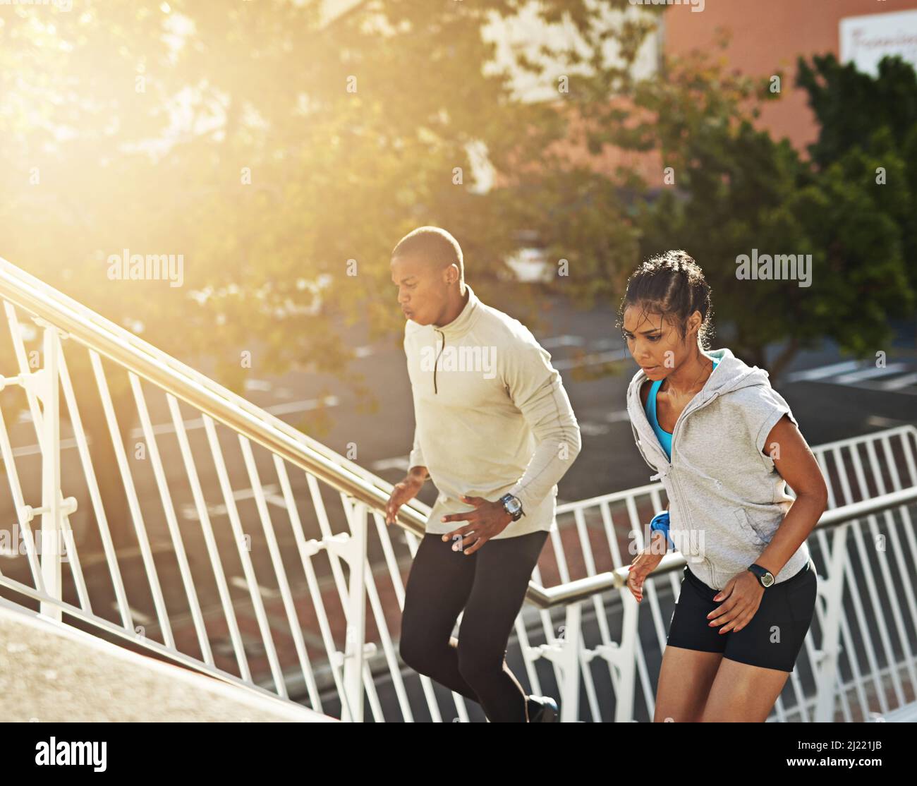 Running is their passion and not just a sport. Shot of a young sporty ...