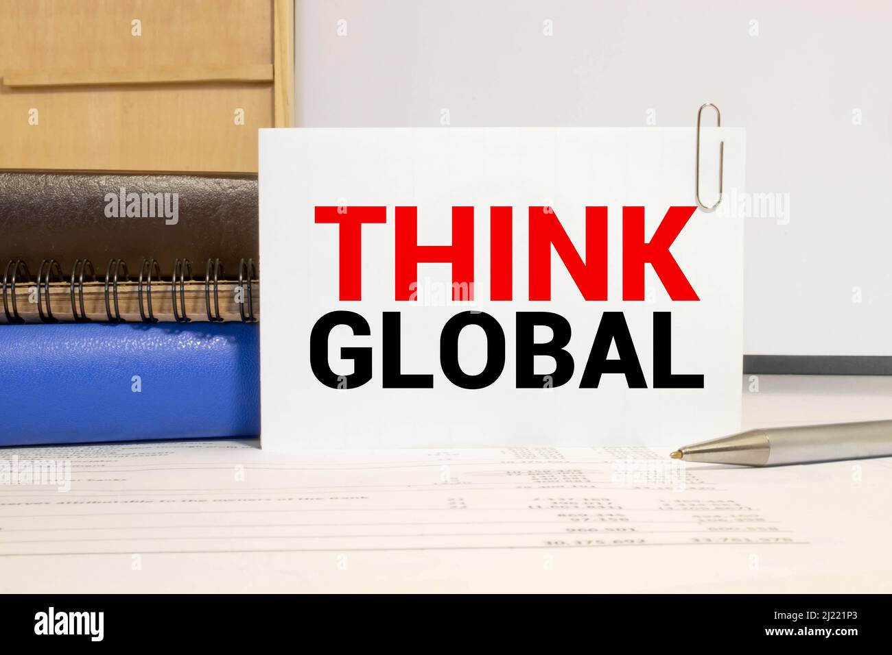 Think Global Concept, Think Global text on card Stock Photo - Alamy