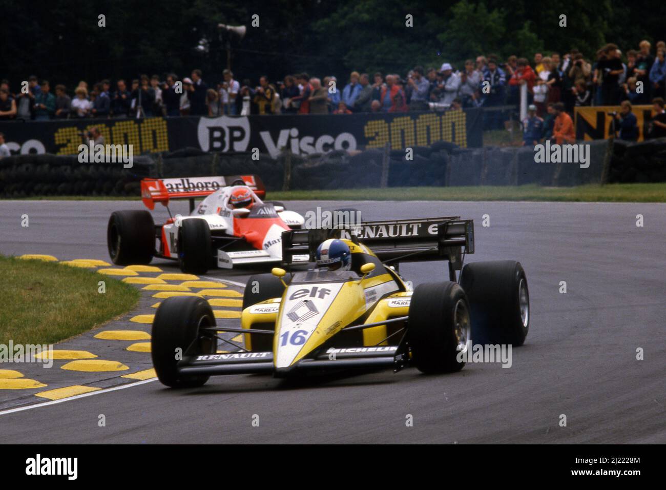 Derek Warwick (GBR) Renault RE50 2nd position lead Niki Lauda (AUT) McLaren MP4/2 Tag Porsche ...