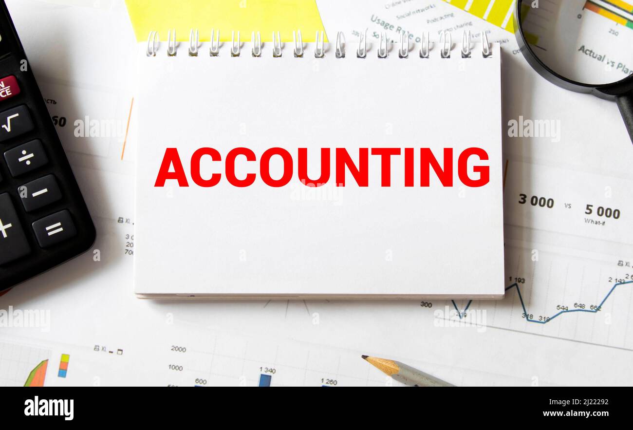 Red pen and notepad with text ACCOUNTING in the white background Stock ...