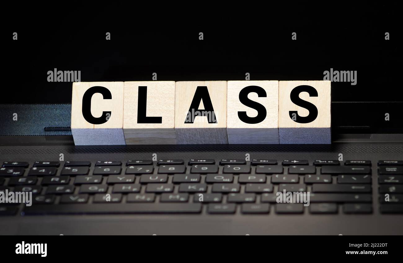 Letter block in word CLASS on wood background Stock Photo - Alamy