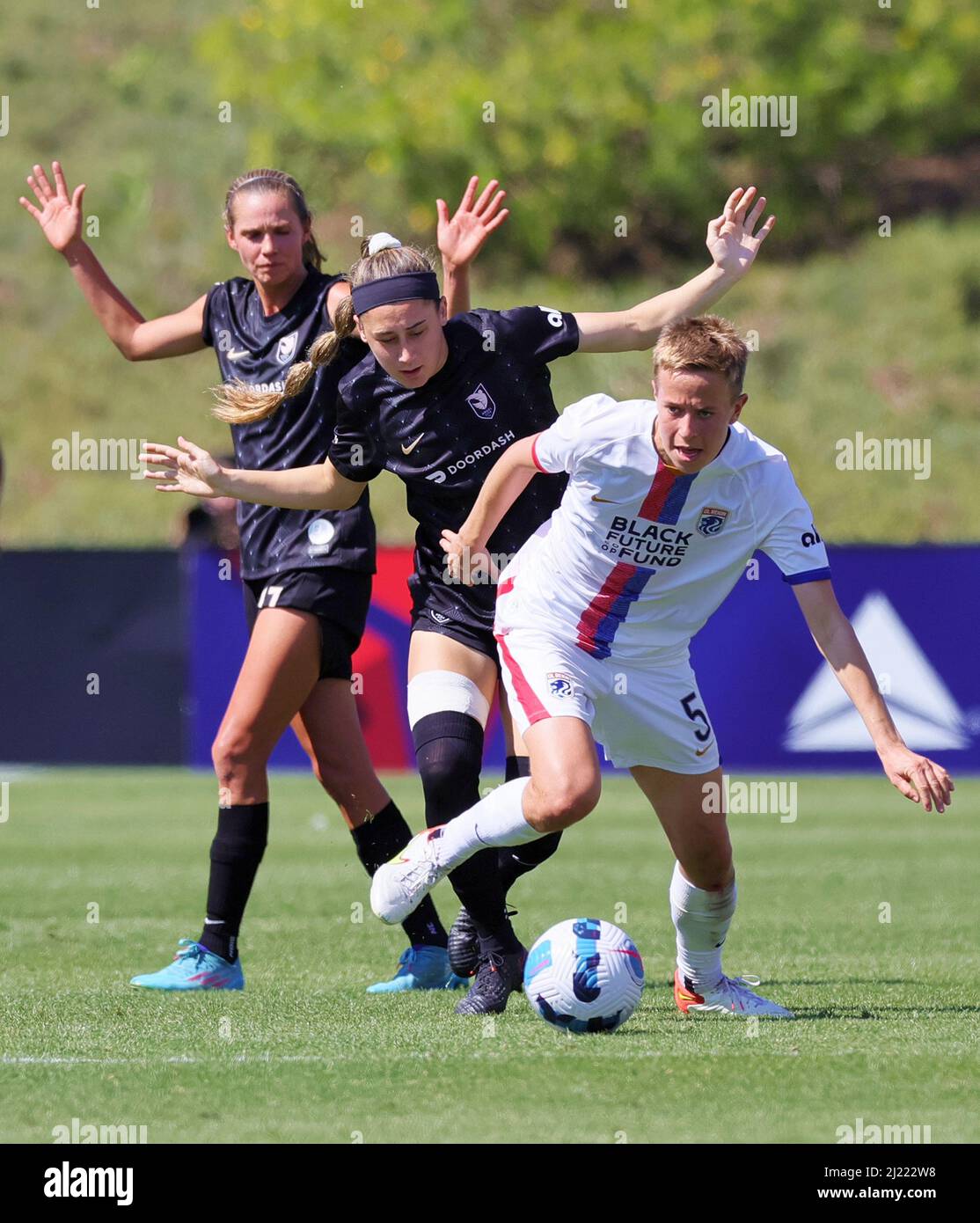 OL Reign Midfielder Quinn (5) evades Angel City Midfielder Hope Breslin ...