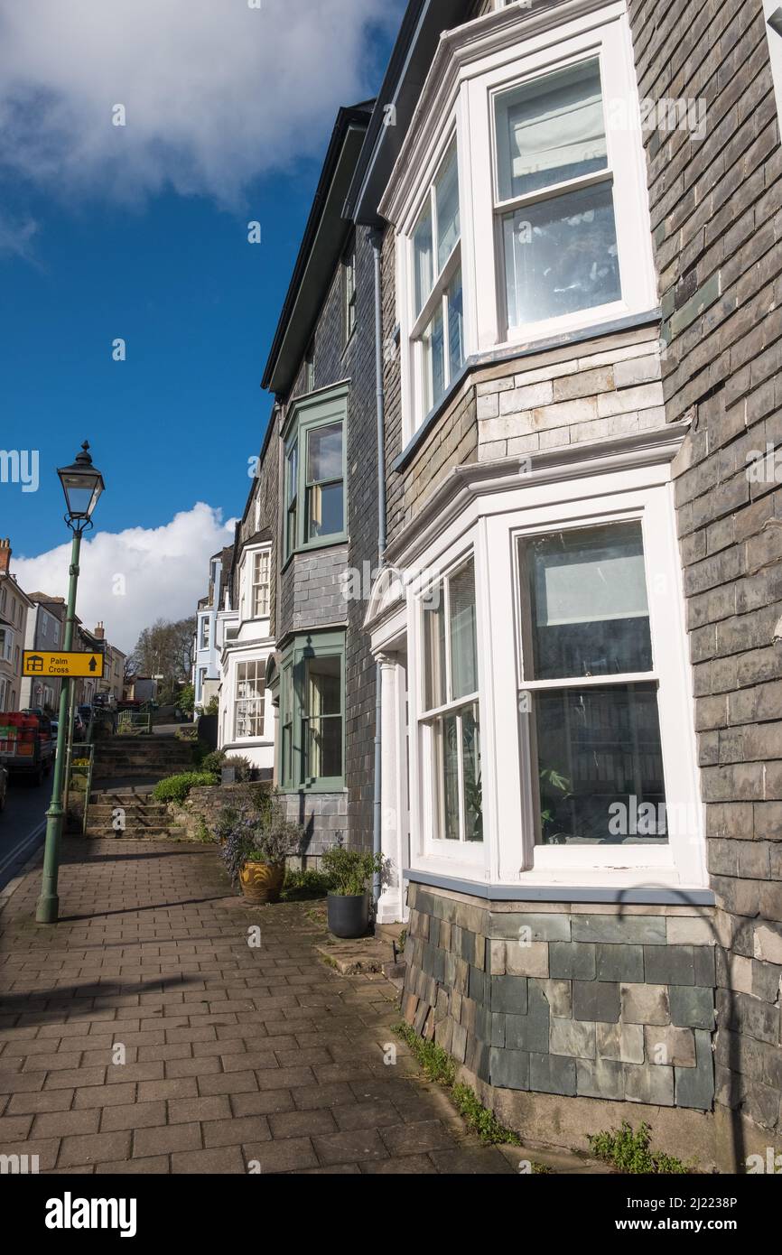 Two storey bay windows on house with slate tiled walls in Modbury ...