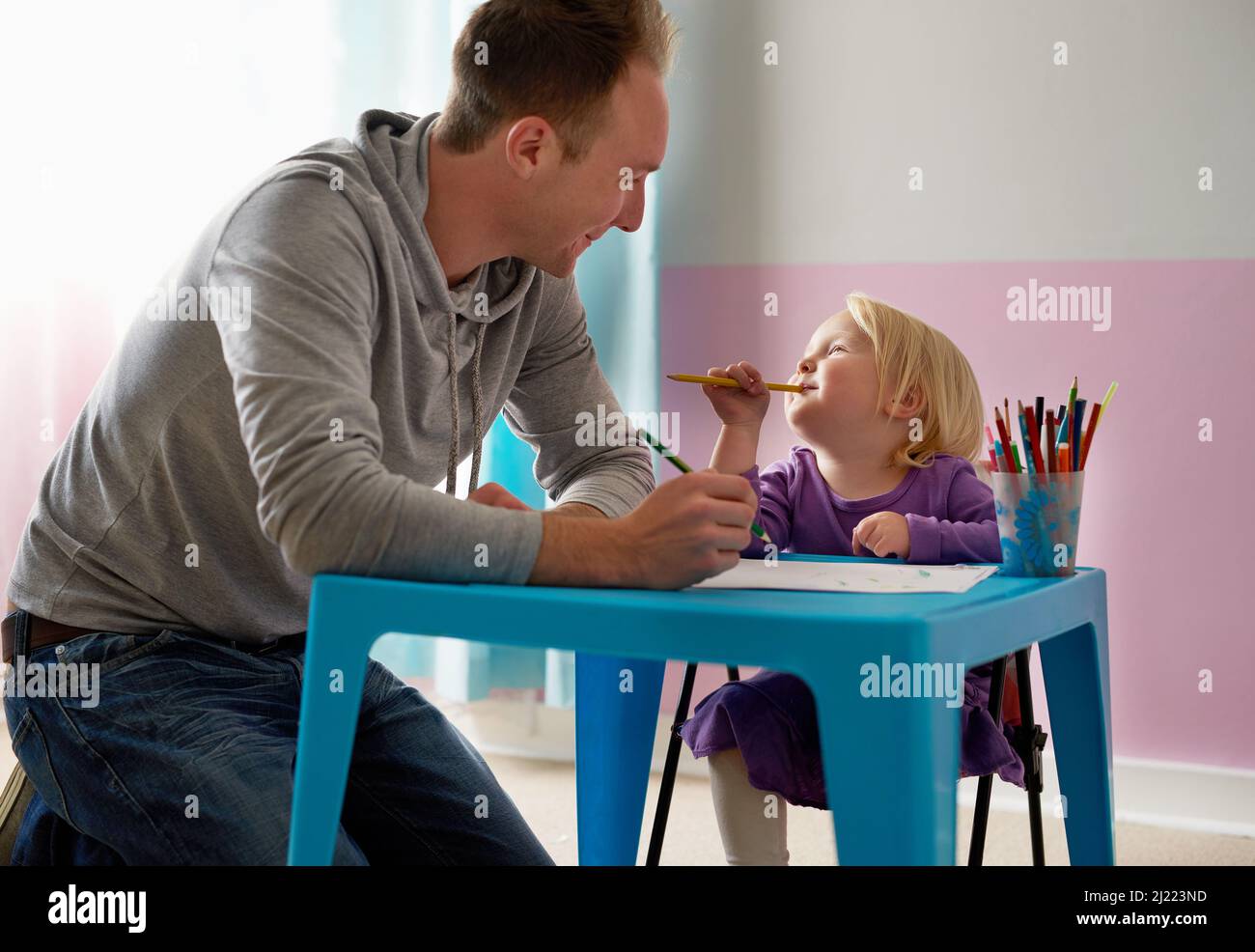 Can you teach me how to write my name Dad. Cropped shot of a father and ...