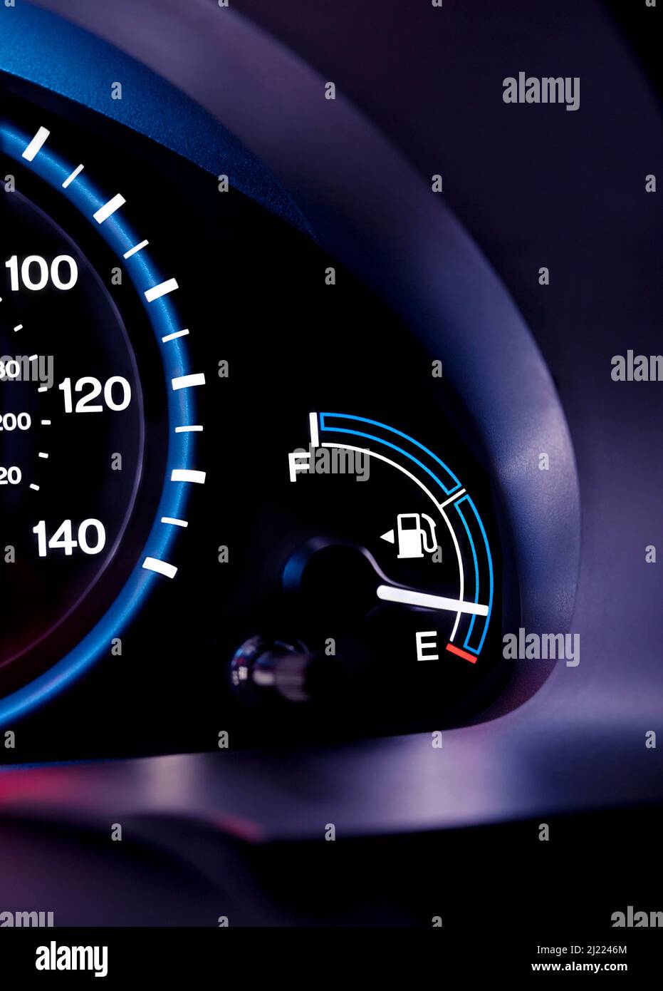 A car interior, the dashboard,instrument panel,and fuel gauge. A ...