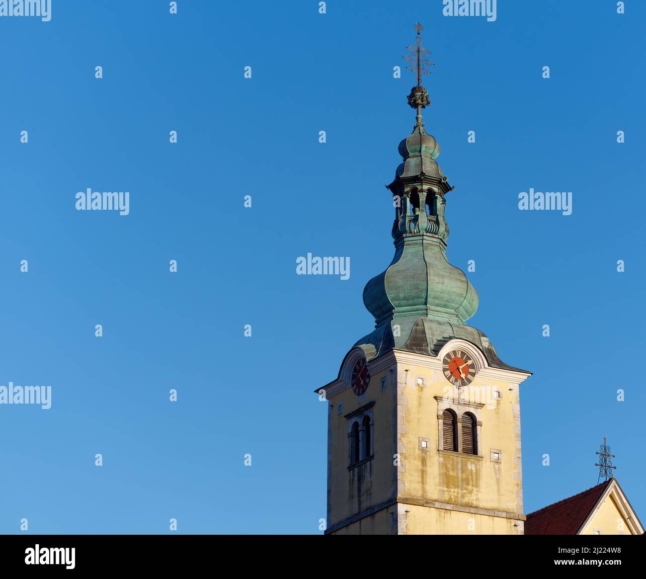 A closeup of the peak of Peter and Paul Cathedral under the clear sky ...
