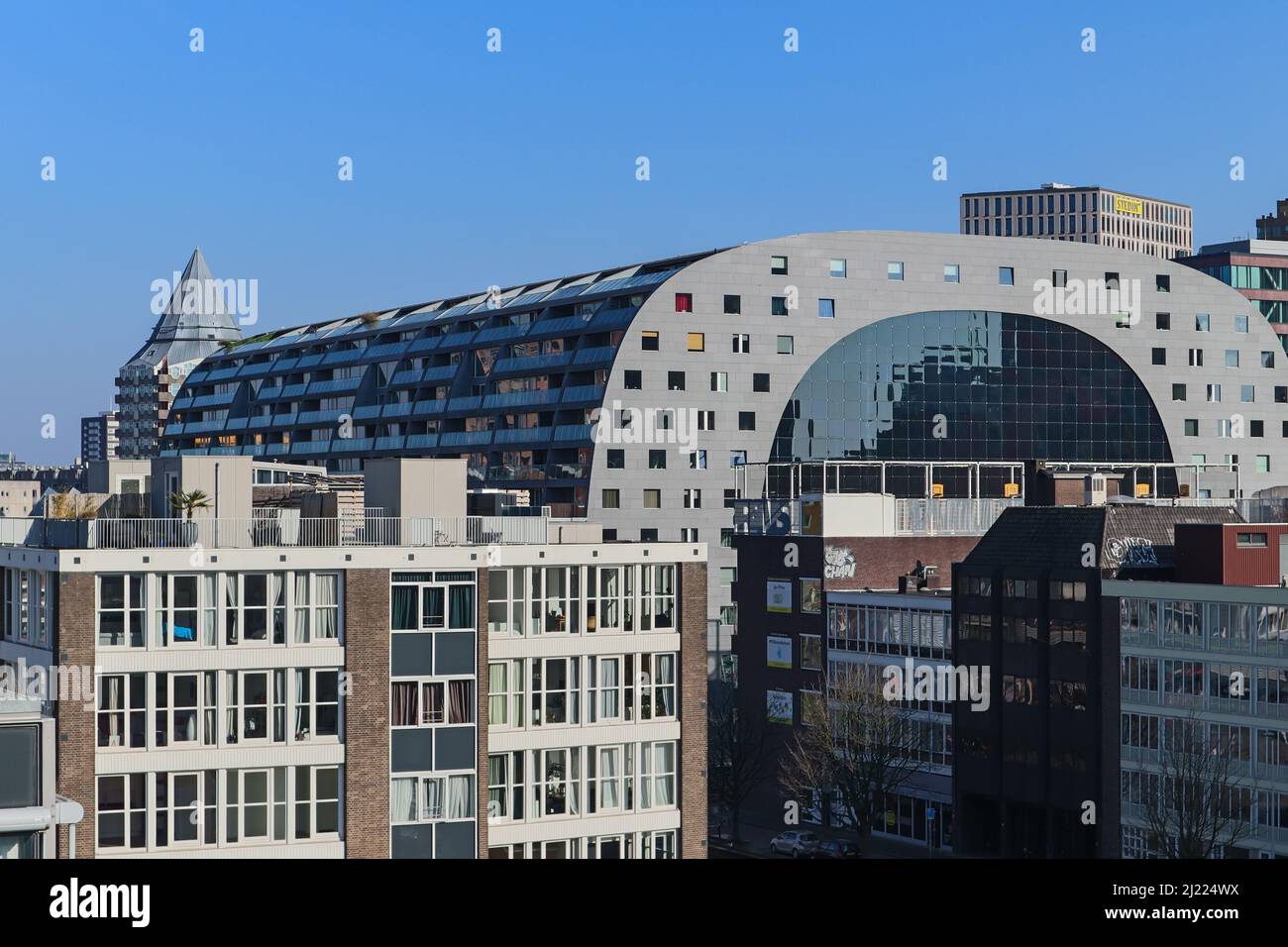 A closeup view of the Market Hall surrounded by other buildings in ...