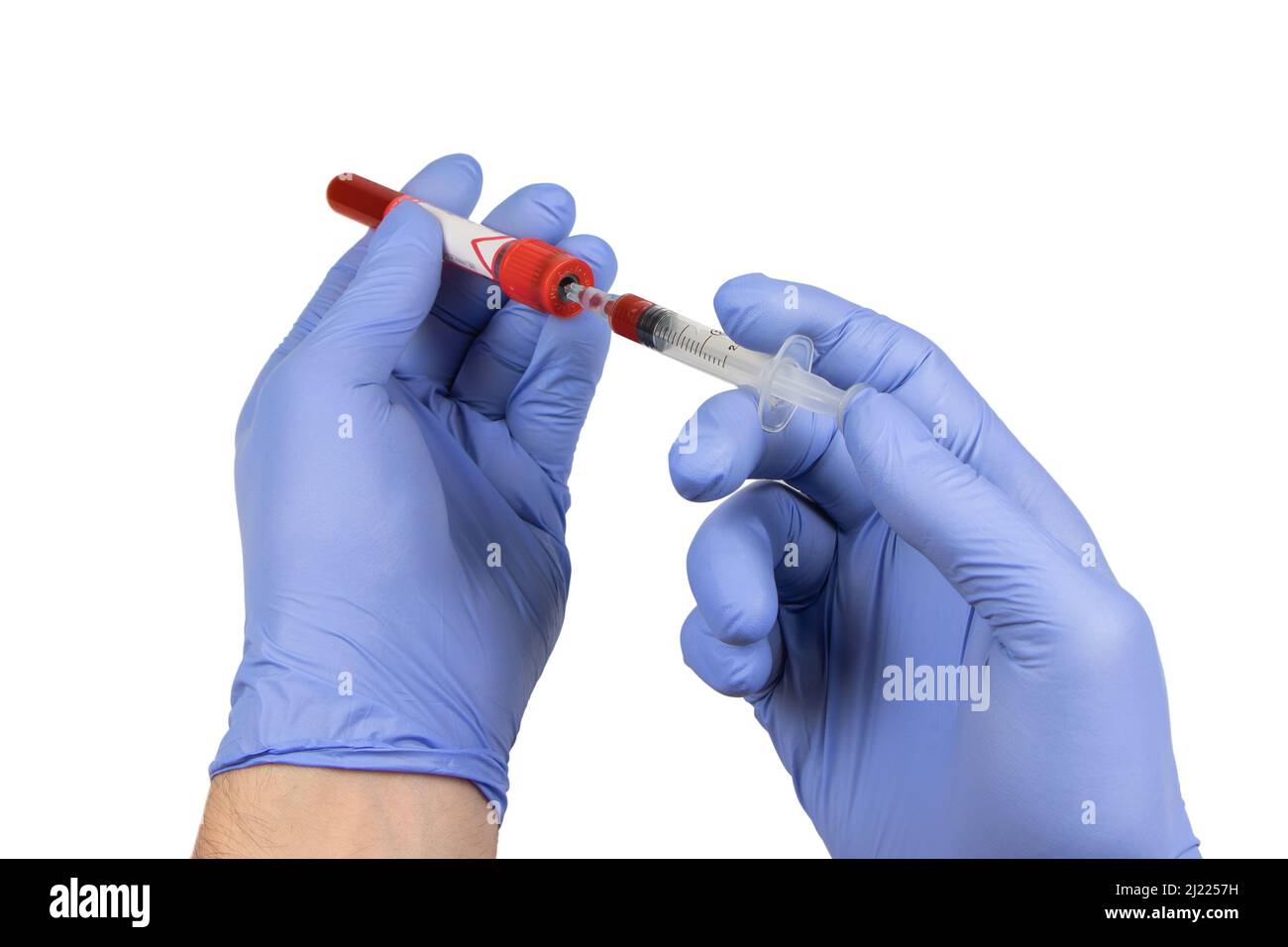 Doctor injecting a blood sample in a test tube analysis Stock Photo - Alamy