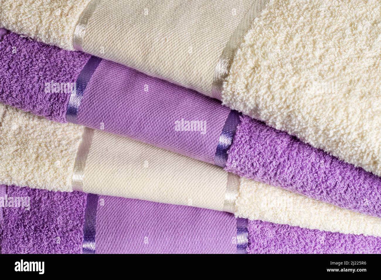 Stacked colored spa towels texture Stock Photo - Alamy