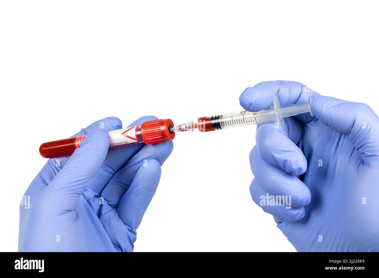 Doctor injecting a blood sample in a test tube analysis Stock Photo - Alamy