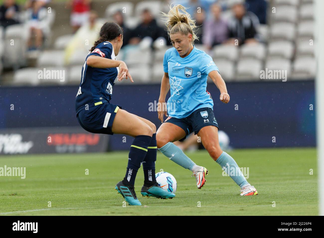 Remy Siemsen of Sydney FC is challenged by Claudia Bunge of Melbourne ...