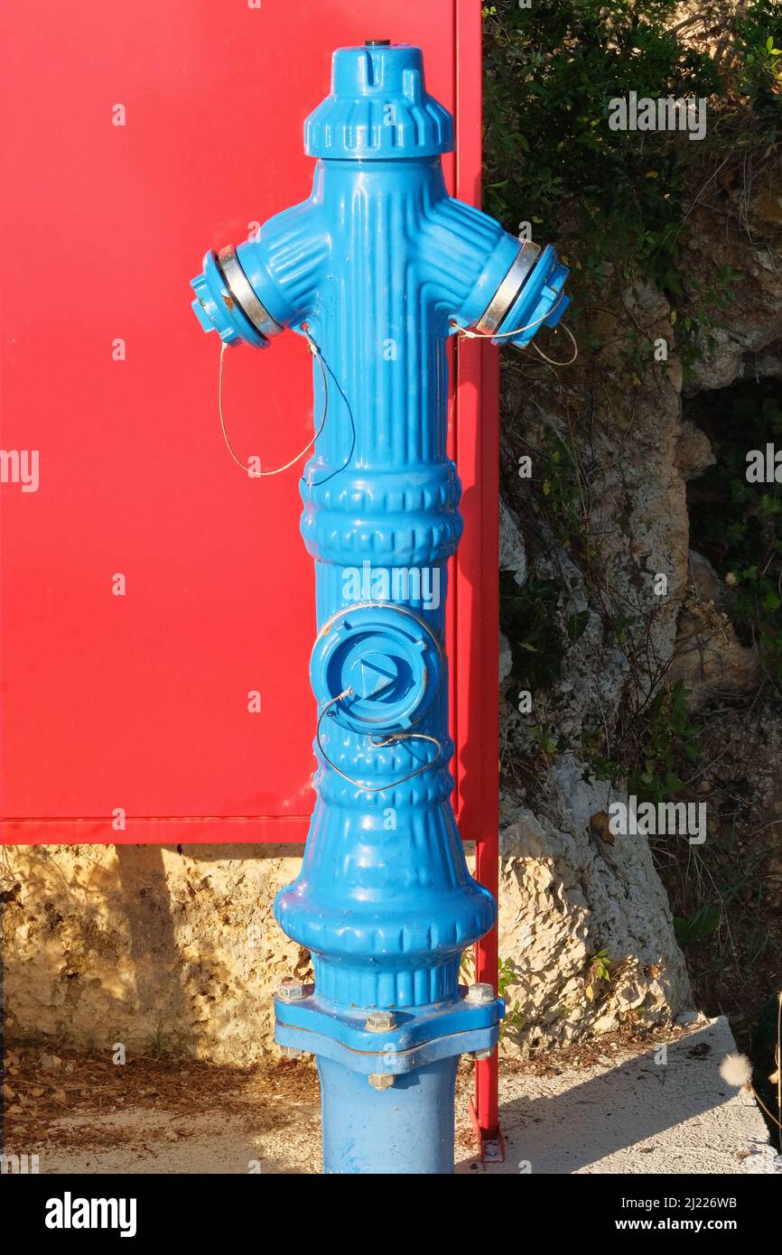 Typical red fire hydrant. Fire hidrant for emergency fire access Stock ...