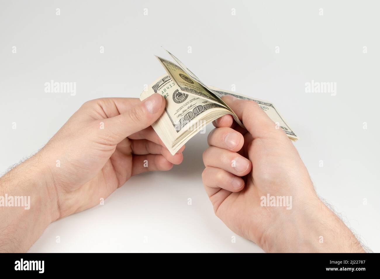 Business woman counting us dollars hi-res stock photography and images ...