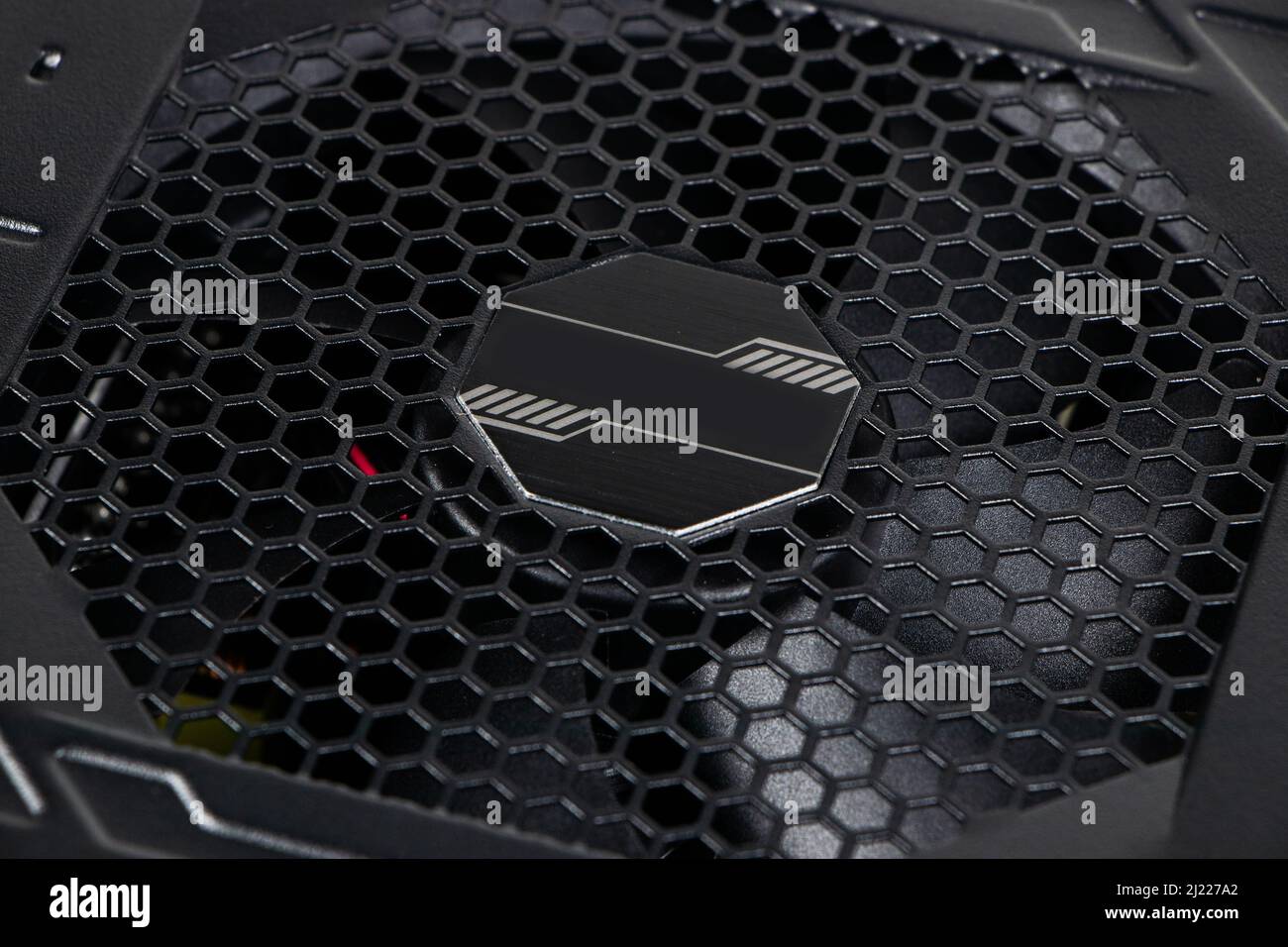 Computer power supply fan background Stock Photo - Alamy