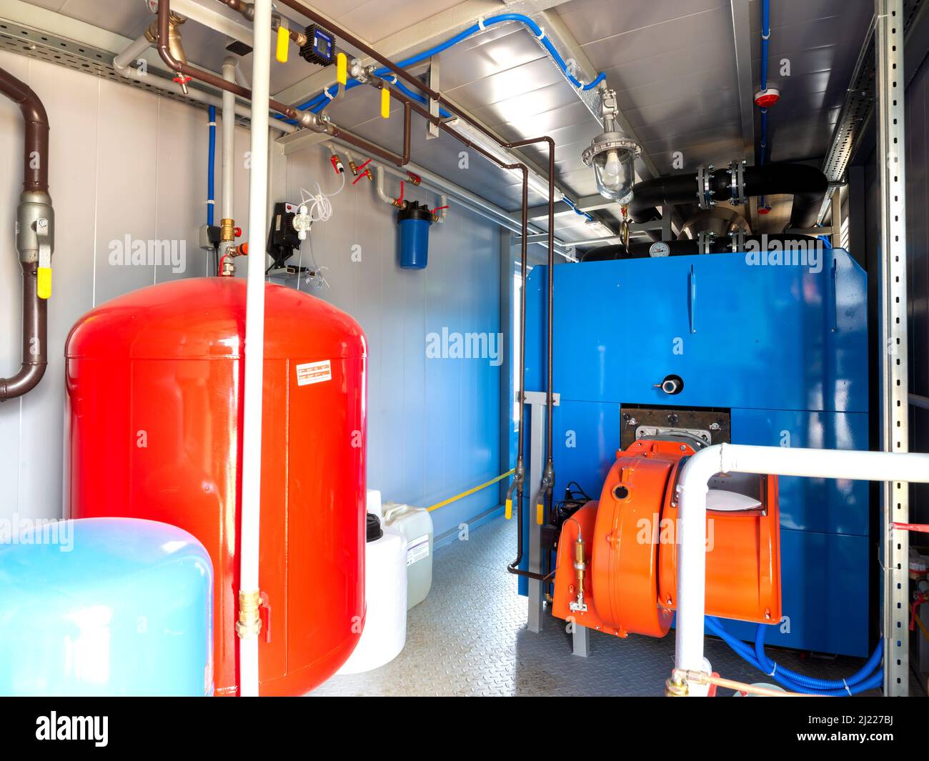 Modern industrial gas boiler room equiped for heating process. Heating ...