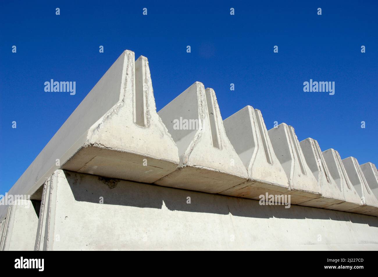 Cement Construction, and center safety rebound Barricades stacked for ...