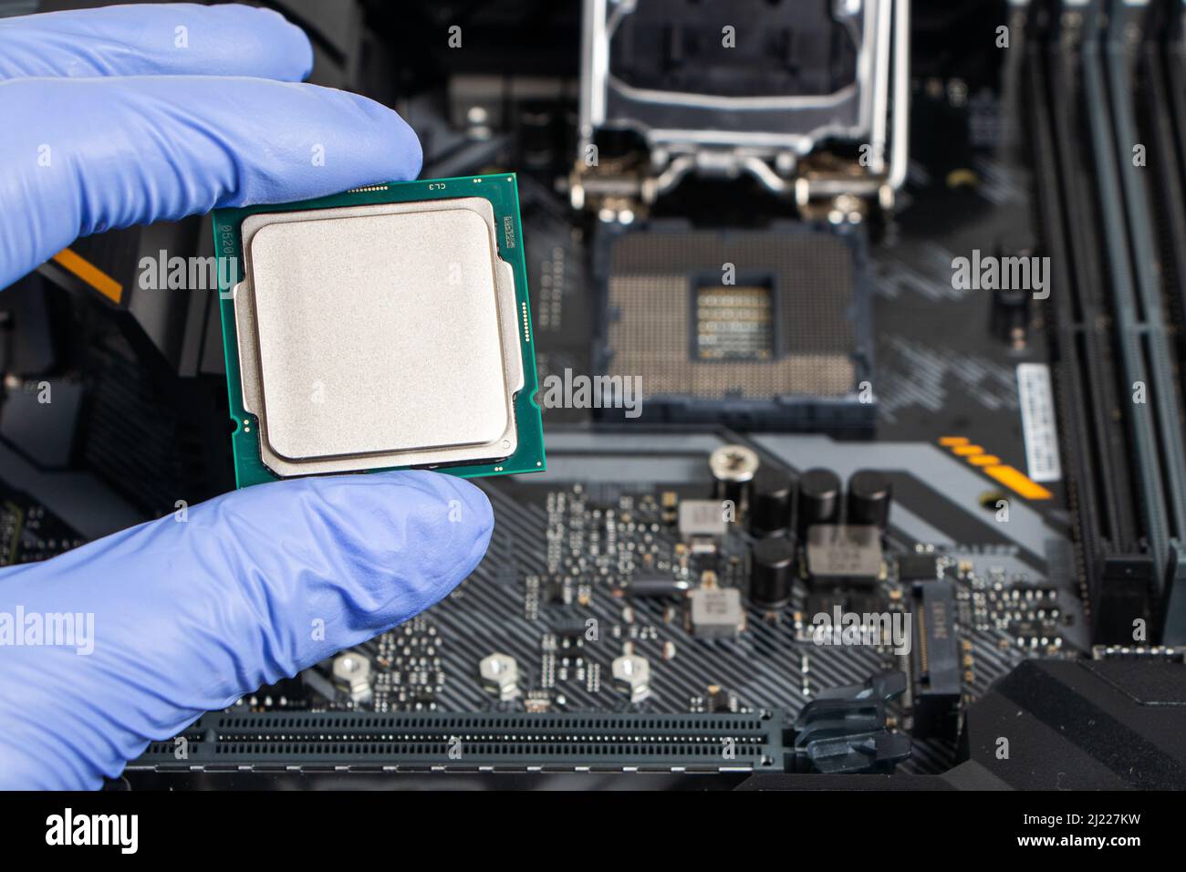 Technician plug in cpu hi-res stock photography and images - Alamy