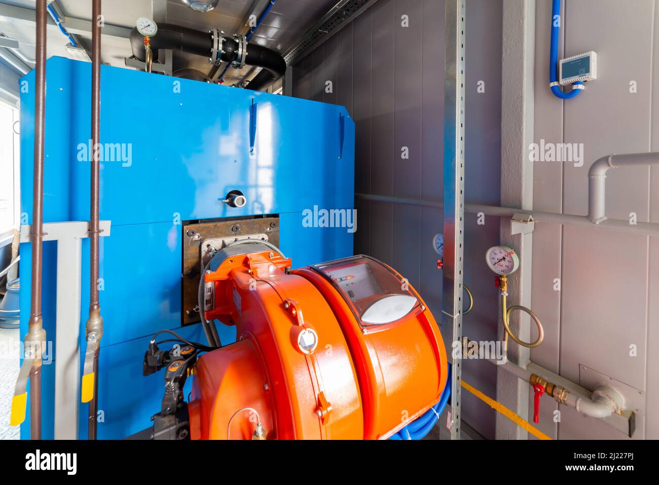 Boiler room equipment - high power boiler burner Stock Photo - Alamy