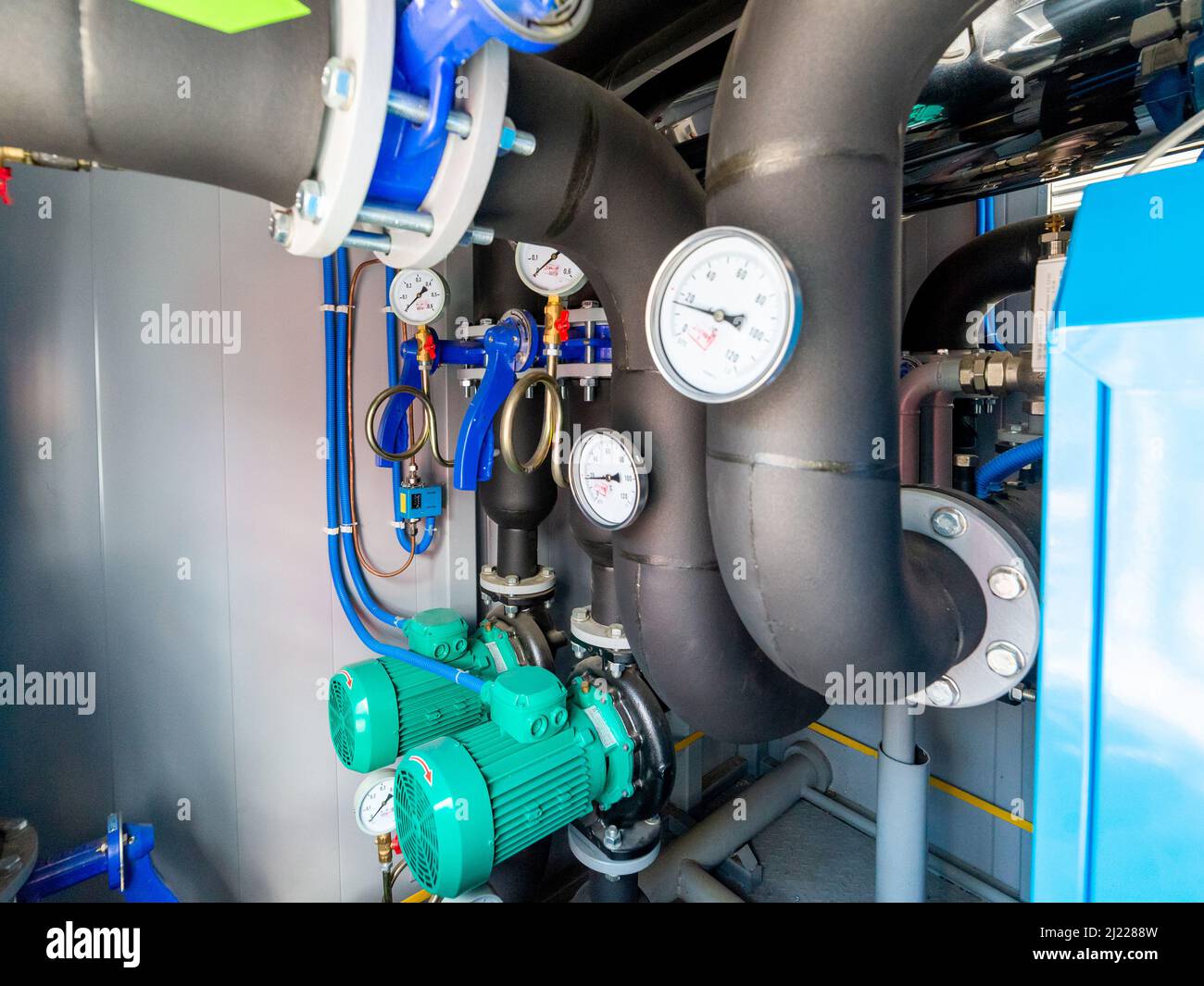 Industrial interior of water pump, valves, pressure gauges, motors ...