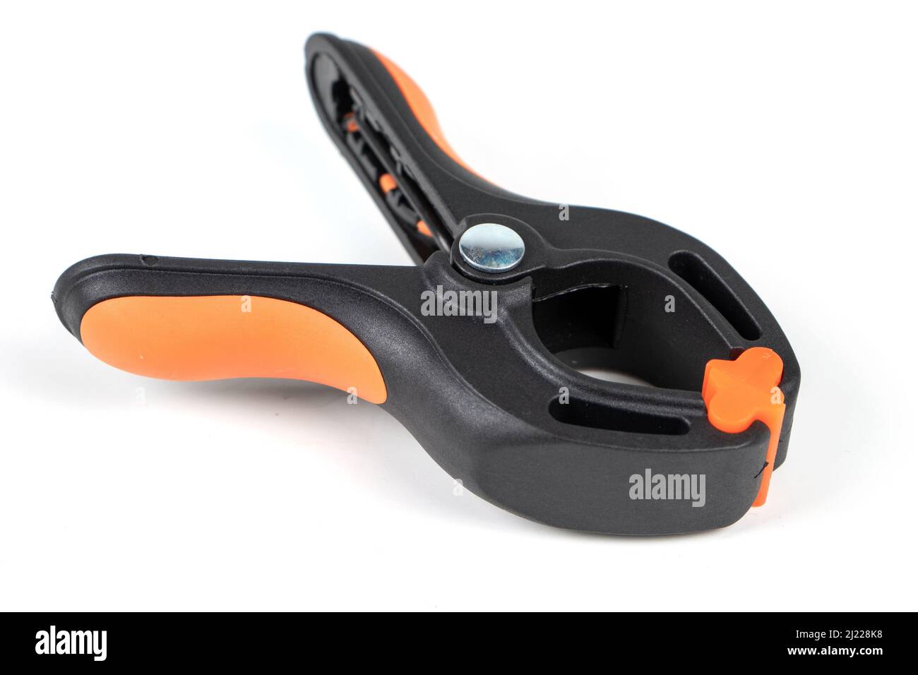 Plastic spring clamp isolated on white background. Clamping equipment ...