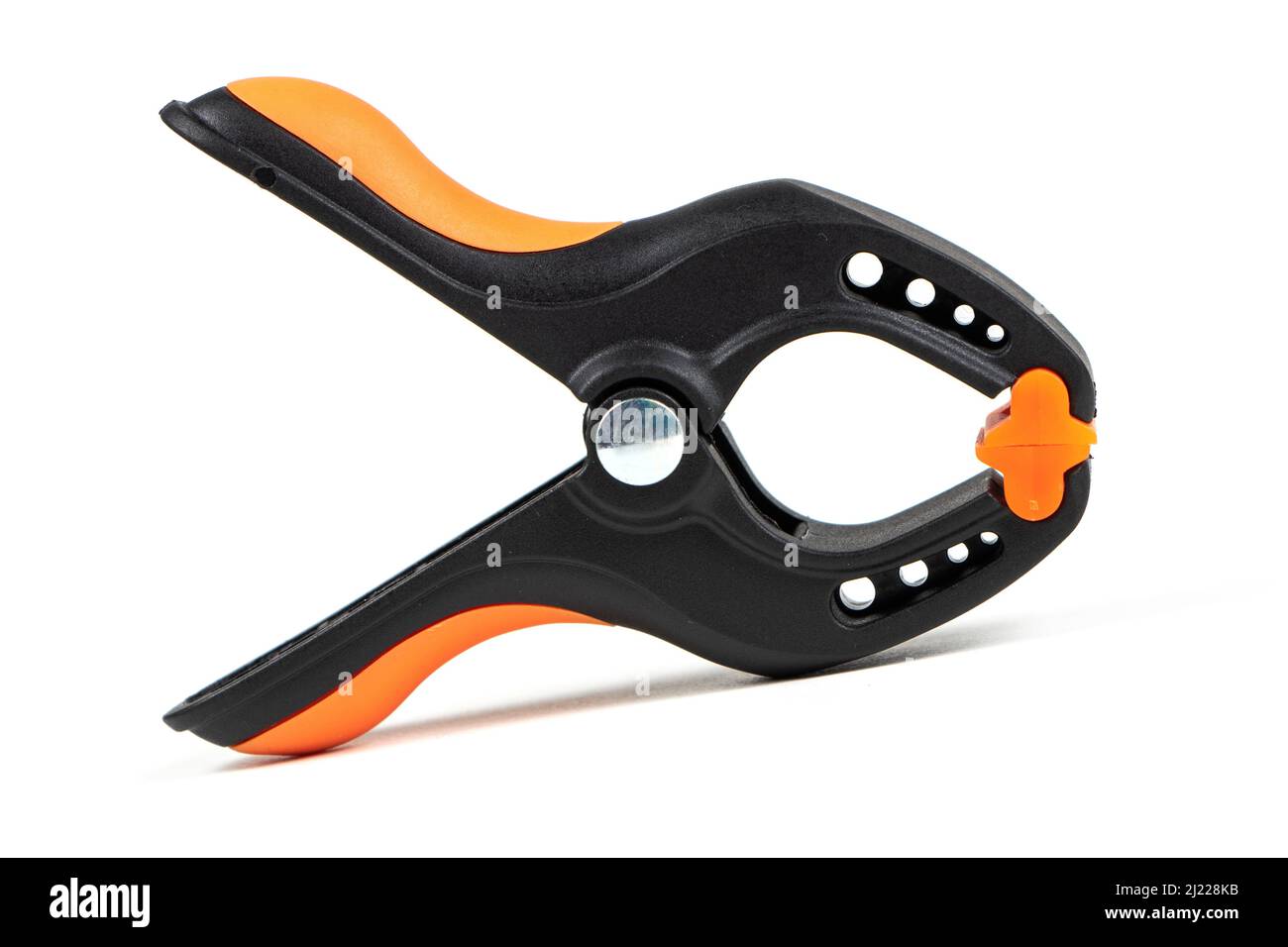 Plastic spring clamp isolated on white background. Clamping equipment ...