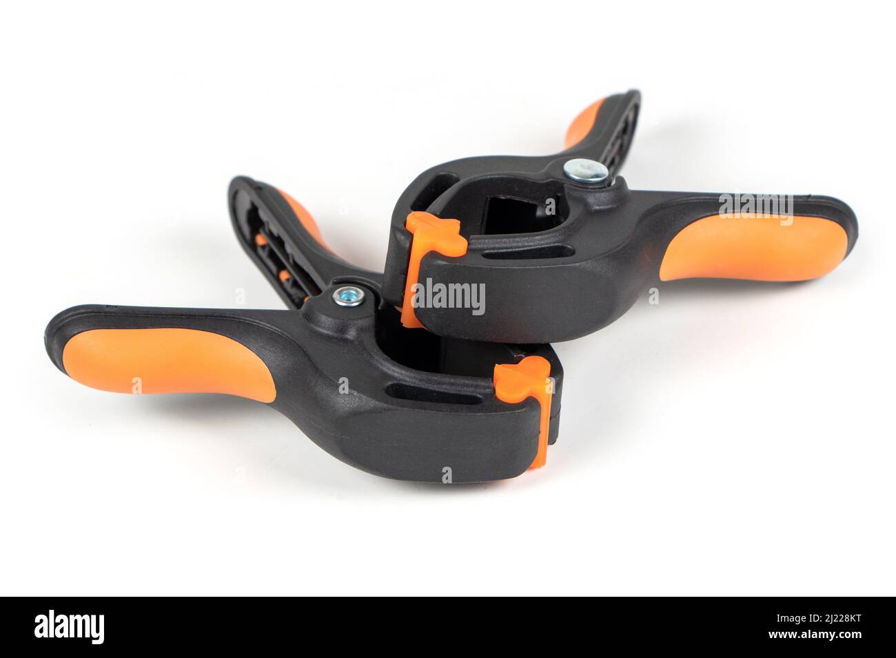 Plastic spring clamp isolated on white background. Clamping equipment ...