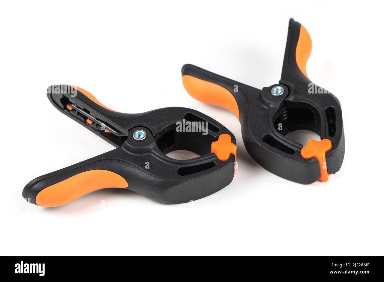 Plastic spring clamp isolated on white background. Clamping equipment ...