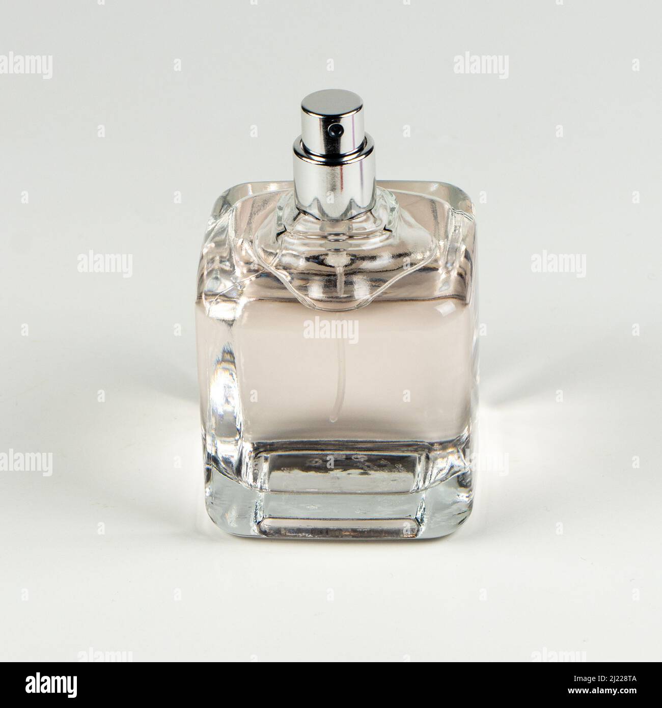 Perfume bottle isolated on white background Stock Photo - Alamy
