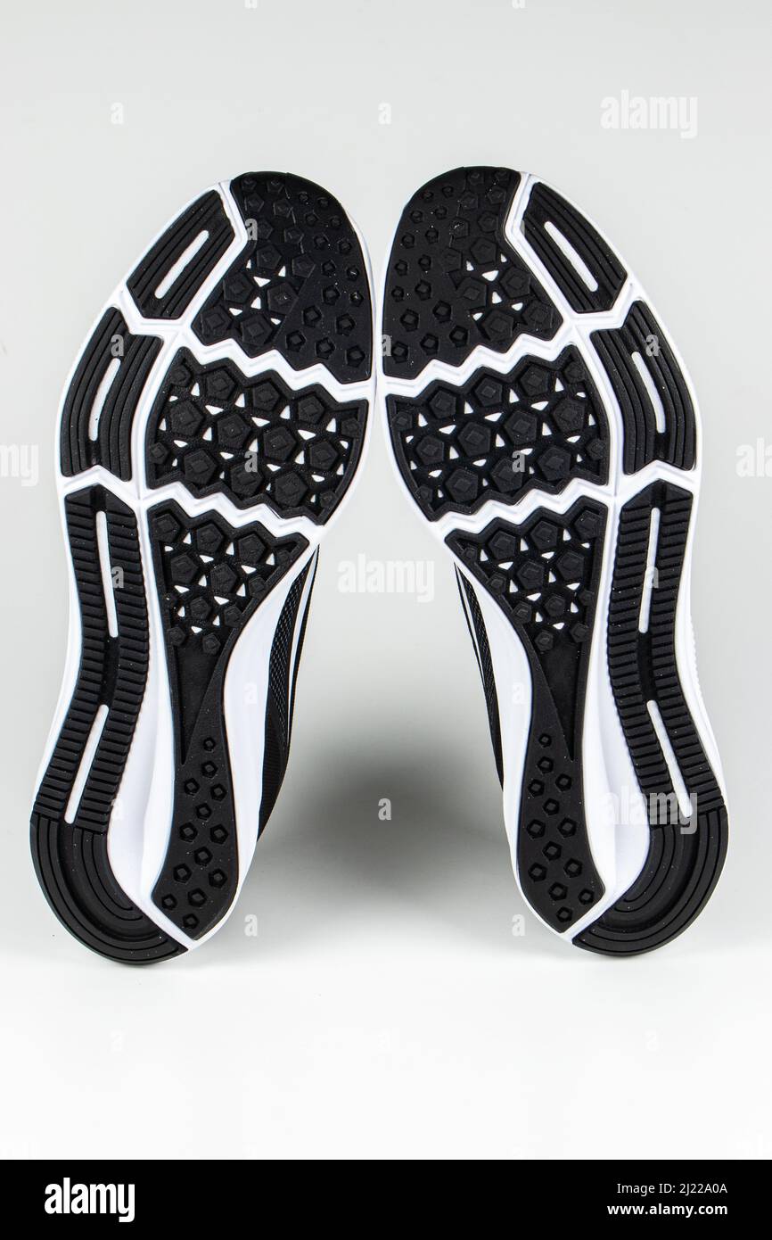 Sole of sport shoe on white background Stock Photo - Alamy