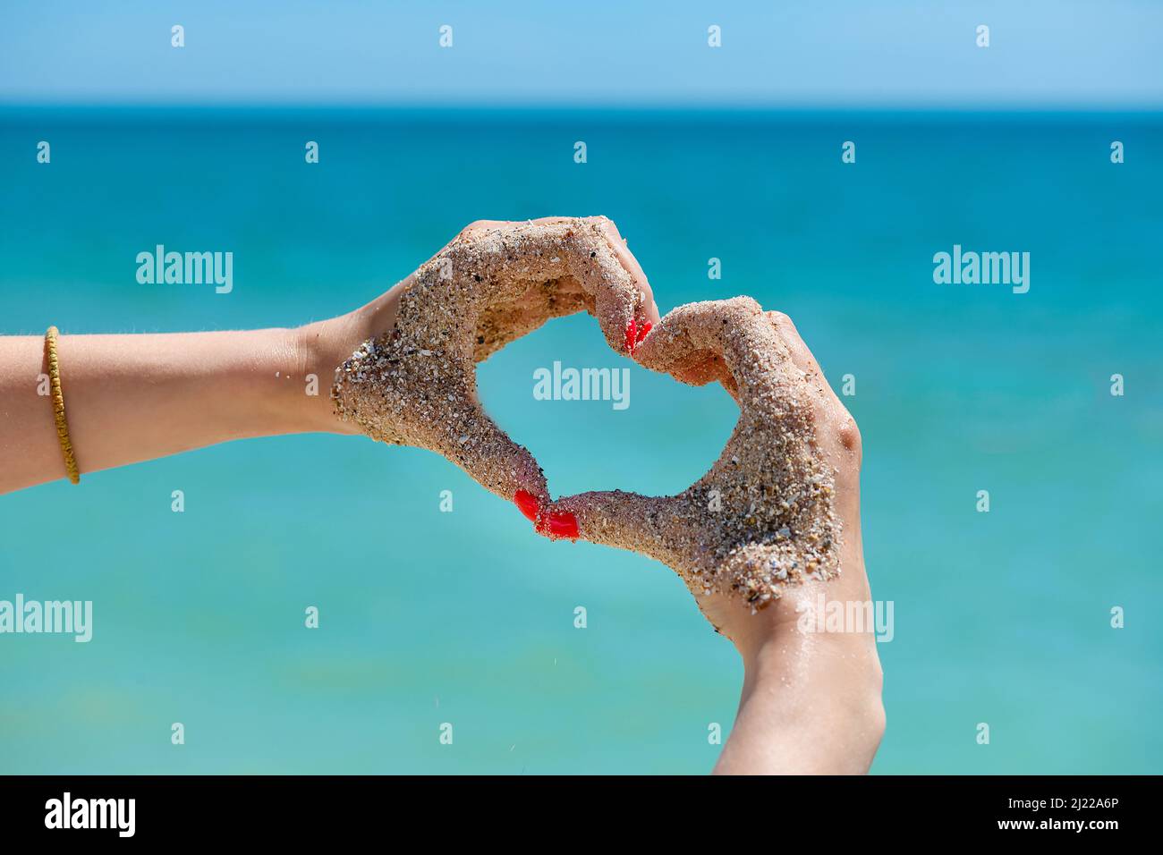 Two hands form heart shape hi-res stock photography and images - Alamy