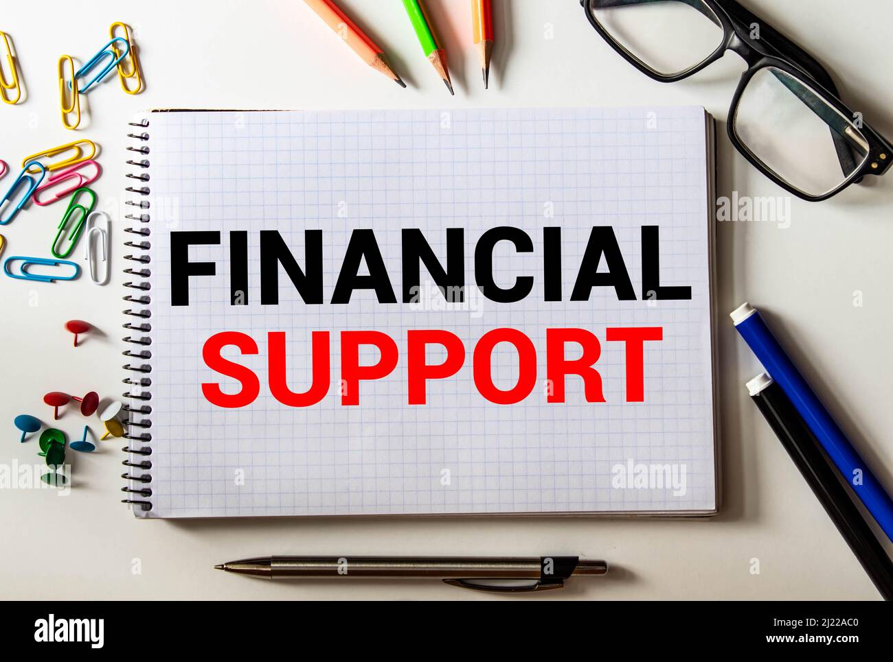 Financial Support text written on a notebook with pencils Stock Photo ...