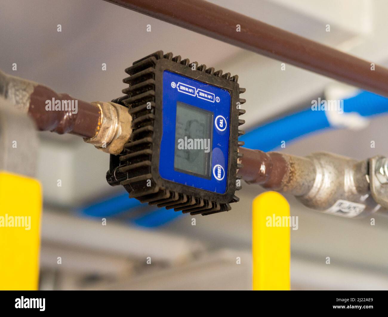 Electromagnetic flowmeter detector and water pipeline. Industrial ...
