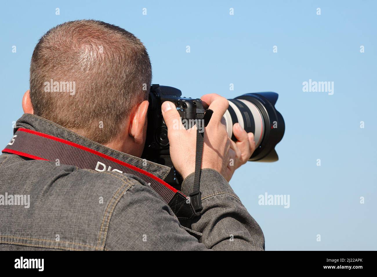 Photographer is ready to take pictures Stock Photo - Alamy