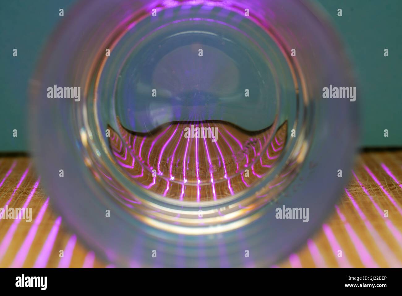 Glass made of crystal-like materials photographed in the studio with ...
