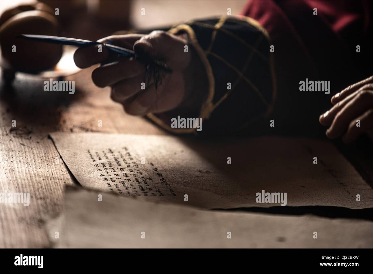 A selective of a hand writing a letter on an old paper Stock Photo - Alamy