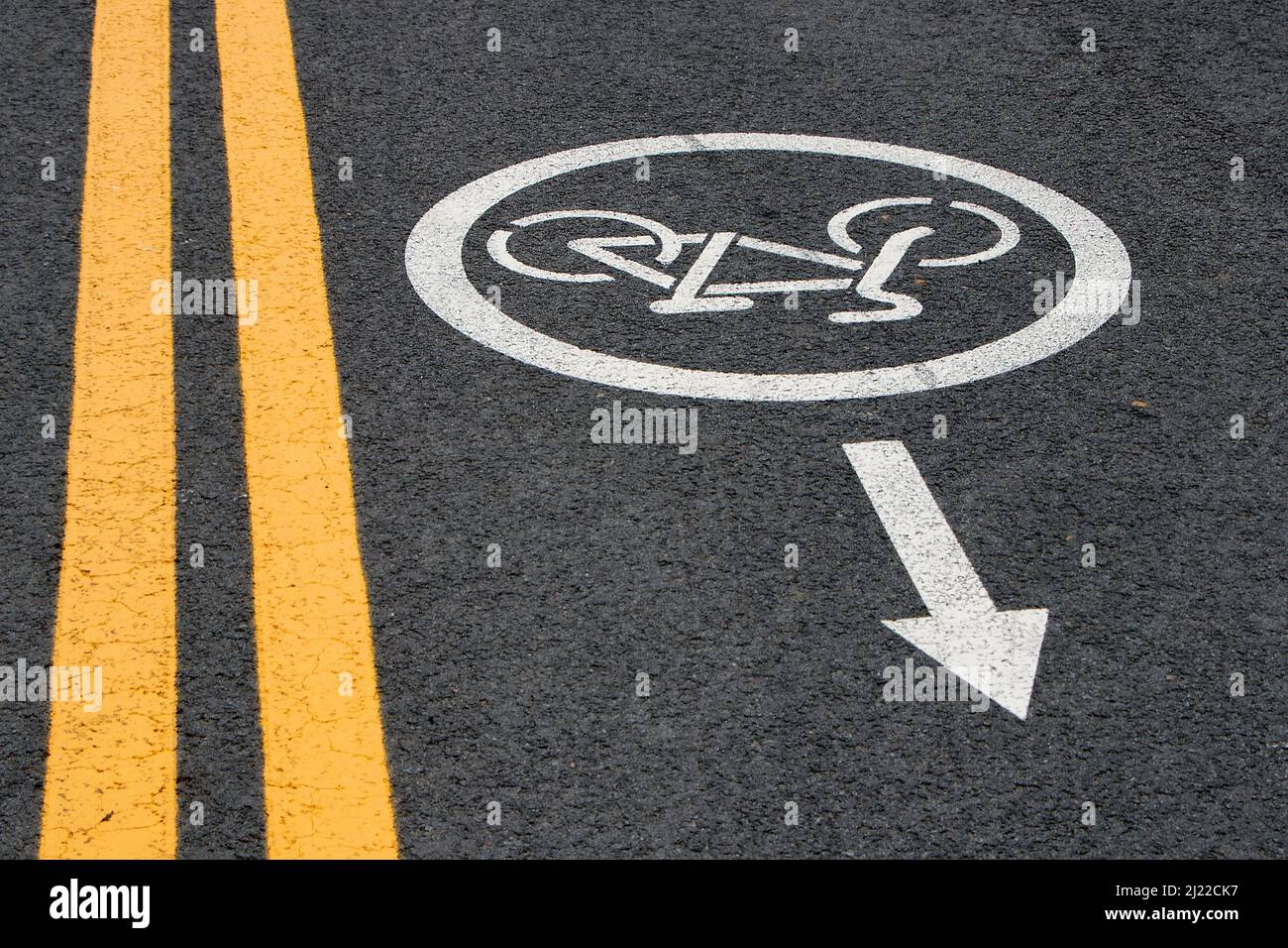 white painted sign for bikes Stock Photo - Alamy